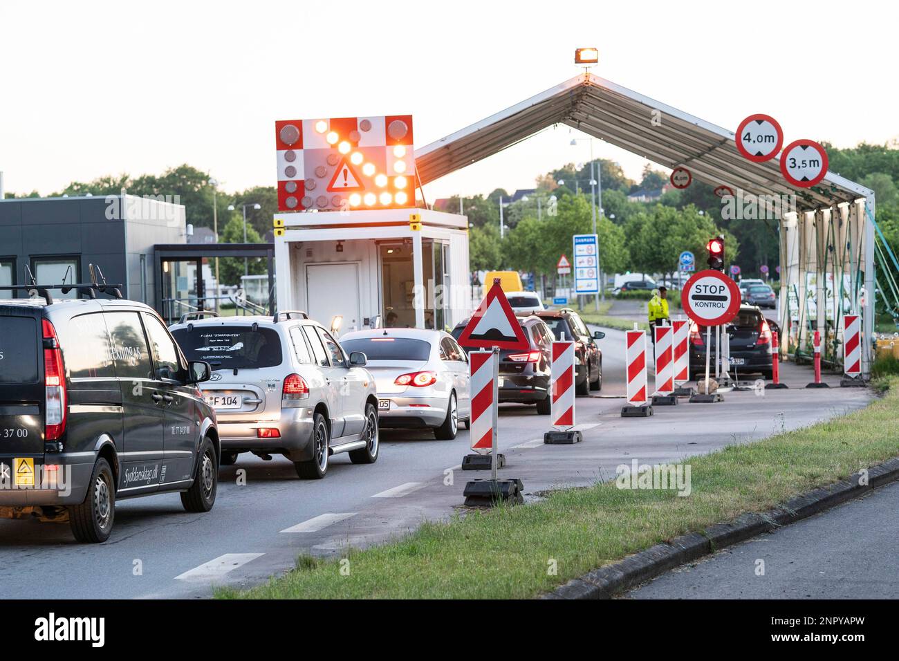Vehicles queue at the border crossing in Krusaa, Denmark, after Denmark ...