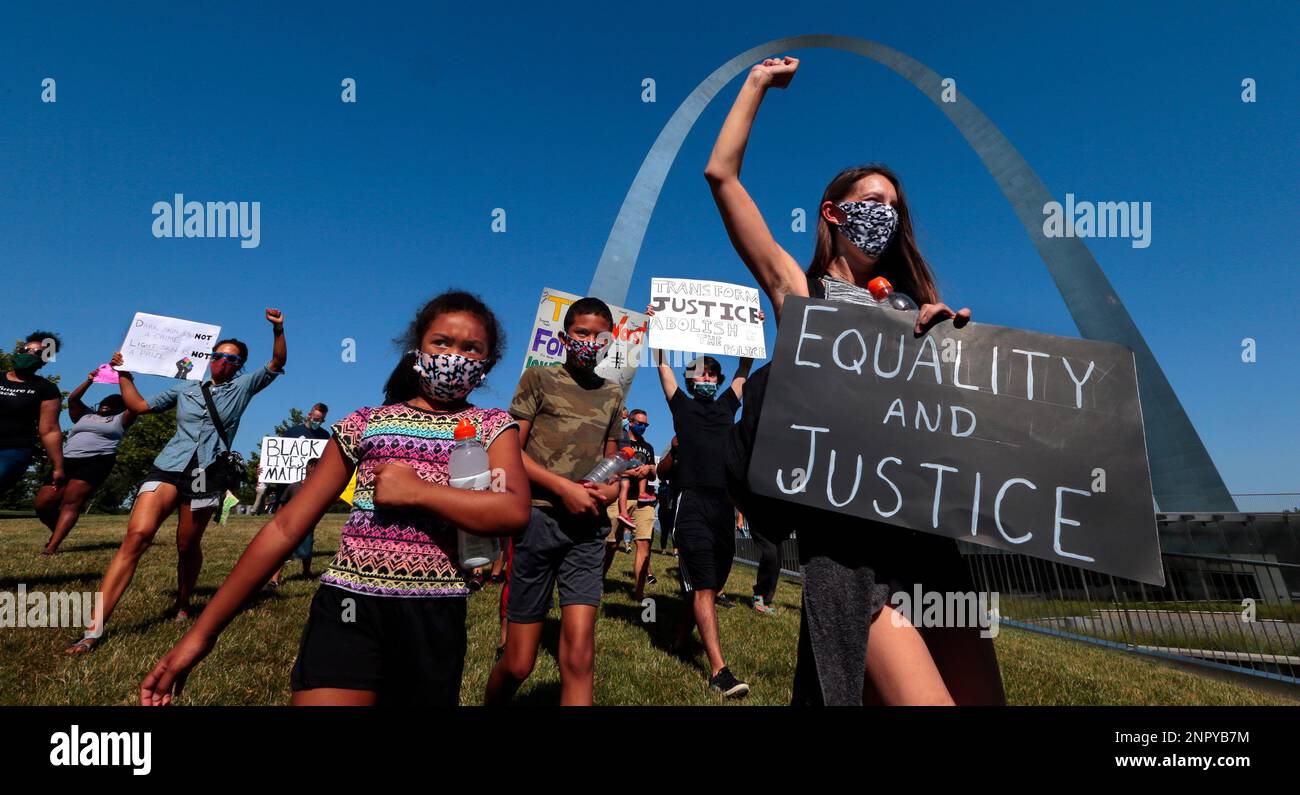 Ruth Gary and her children Richelle, 7, and Jeff, 11, march from the ...