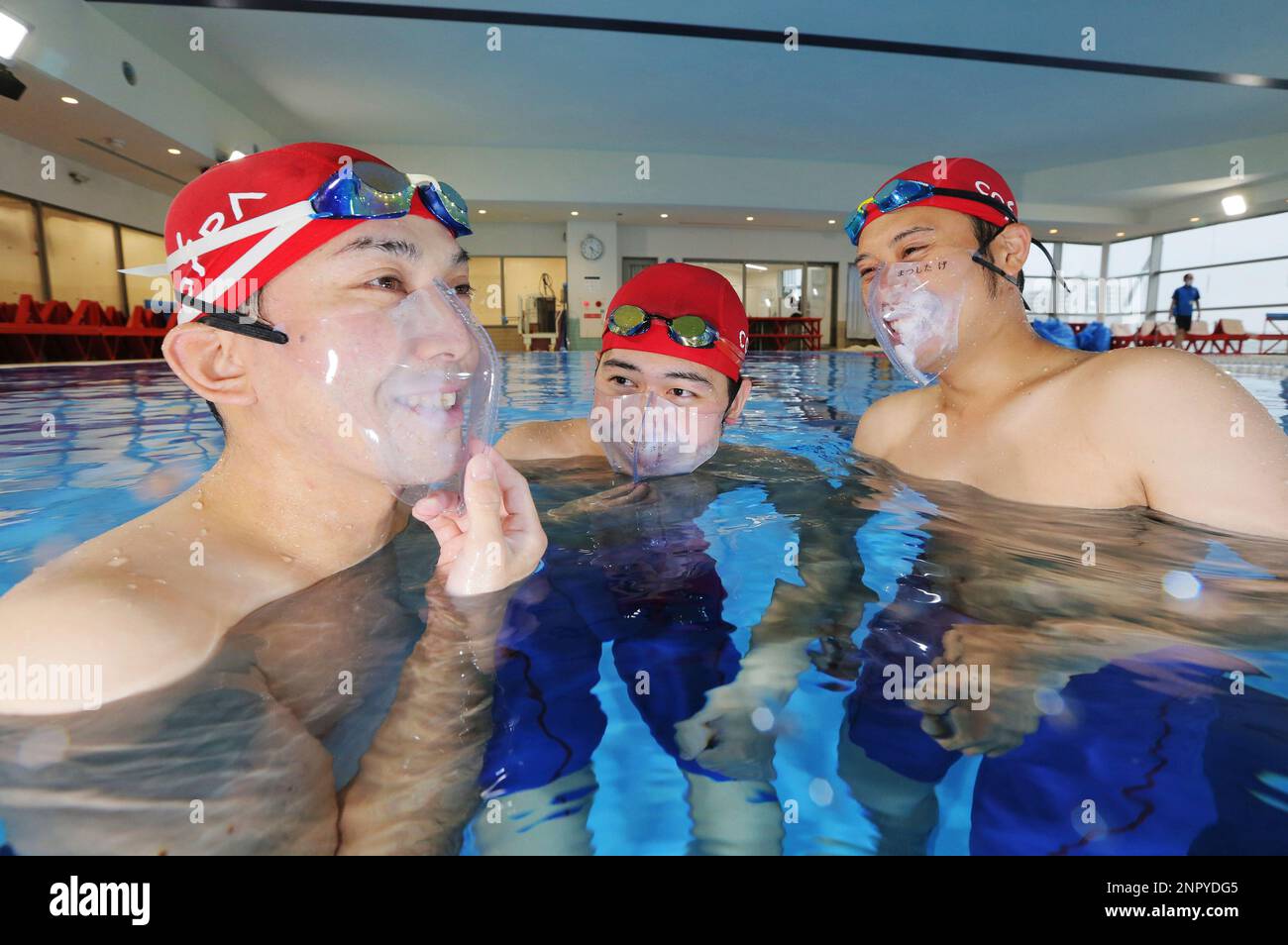 Swimming instructors demonstrate to use a water-proof mask " Pool ...