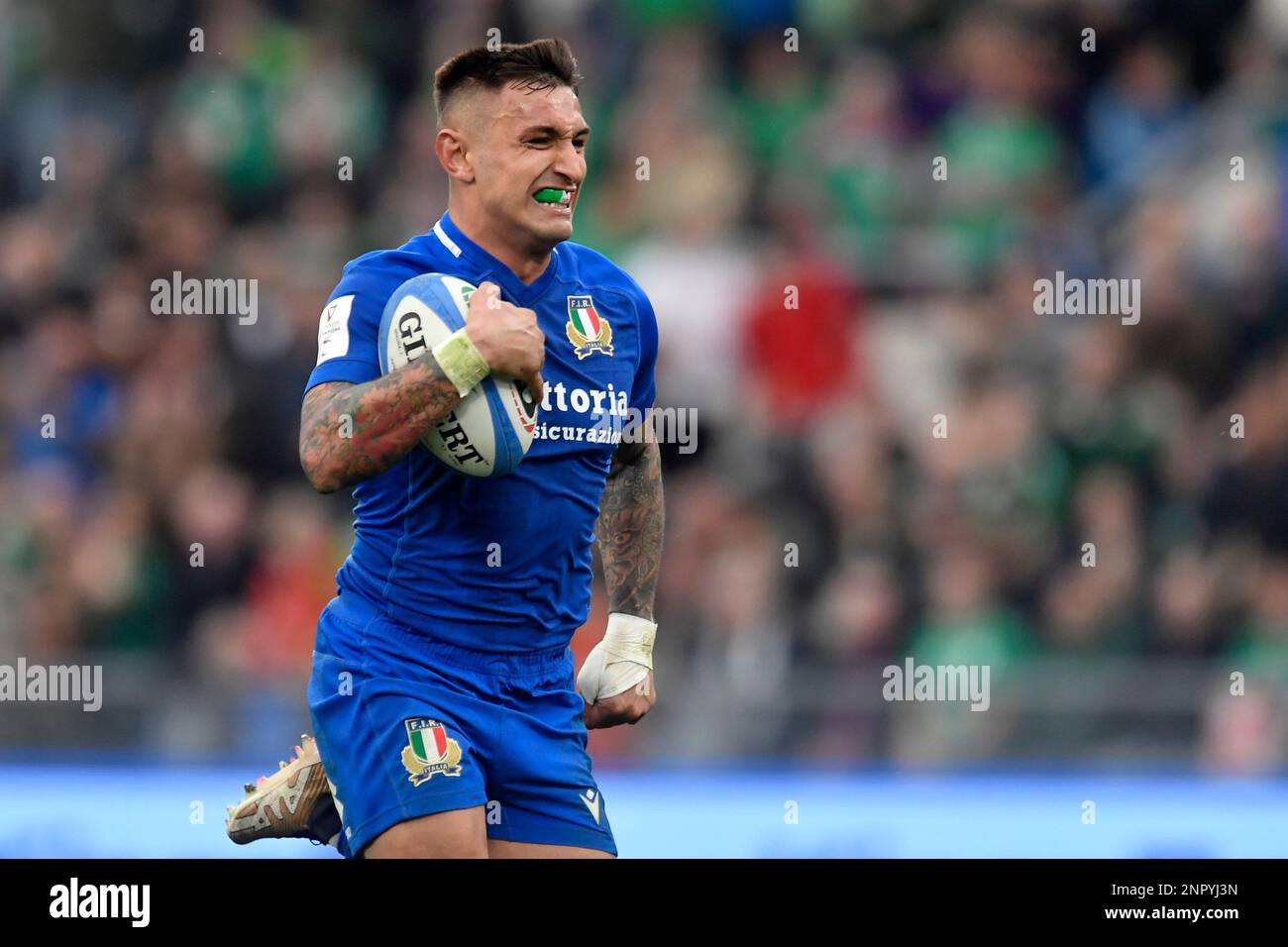 Pierre Bruno of Italy runs to score a try during the Six Nations rugby ...