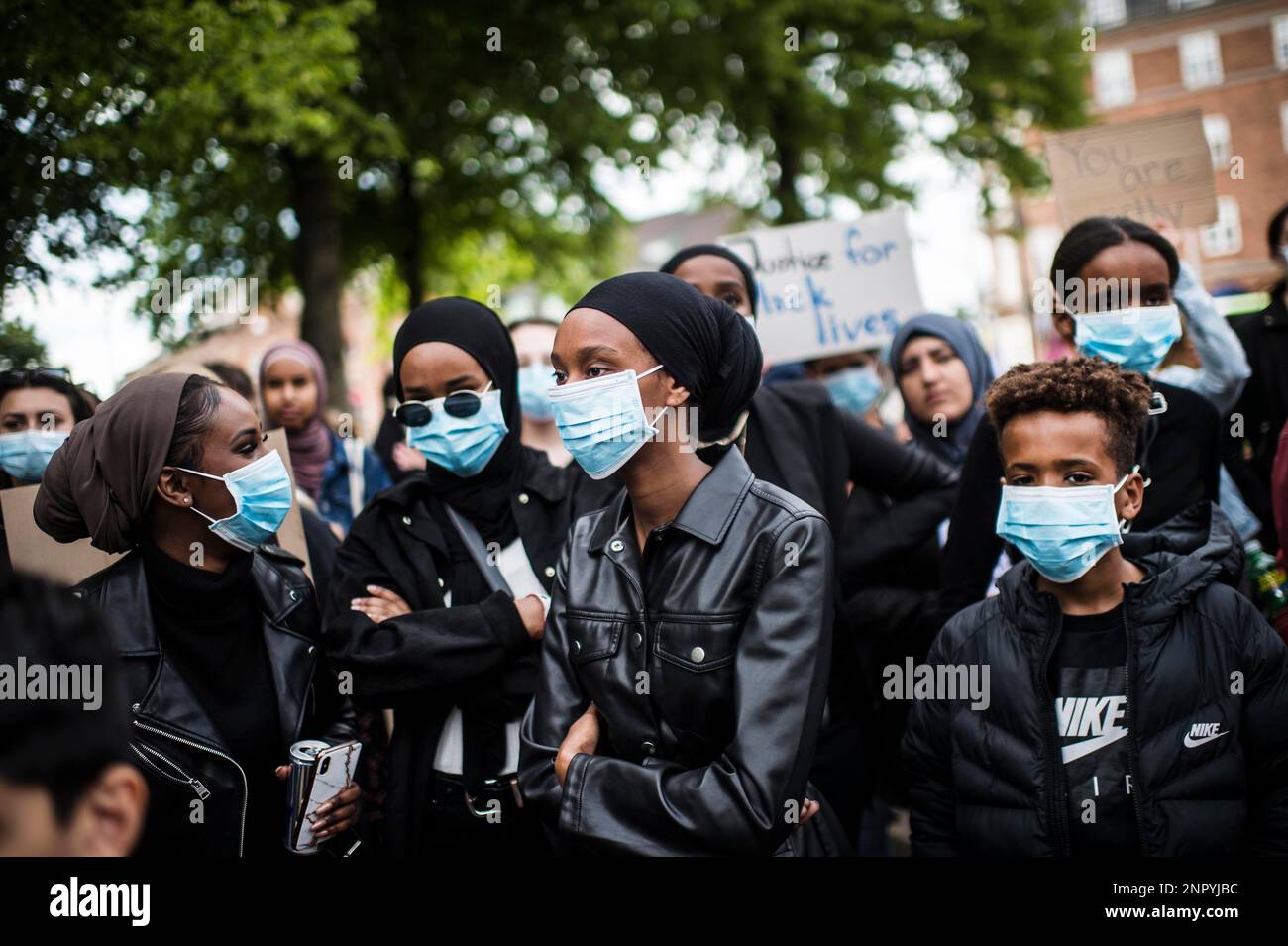 People attend a Black Lives Matter Denmark rally in Odense, Denmark ...