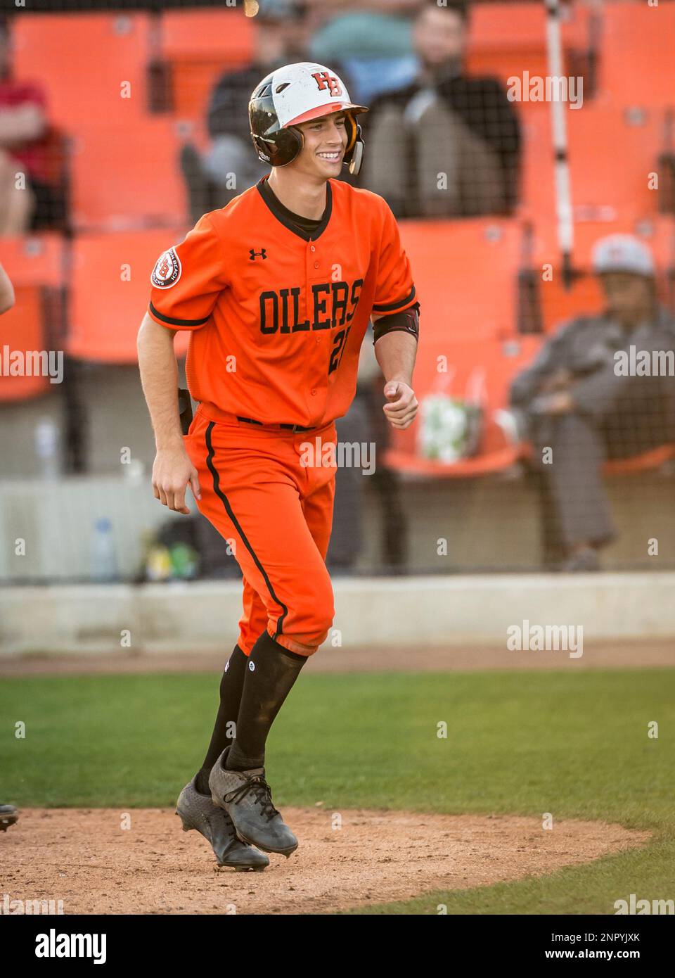 Huntington Beach Oilers Jake Vogel (27) after scoring a run during a ...