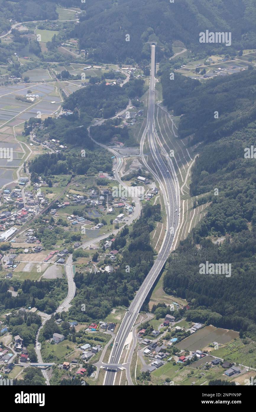 An aerial photo shows Reconstruction Road (R) in Ofunato City, Iwate ...