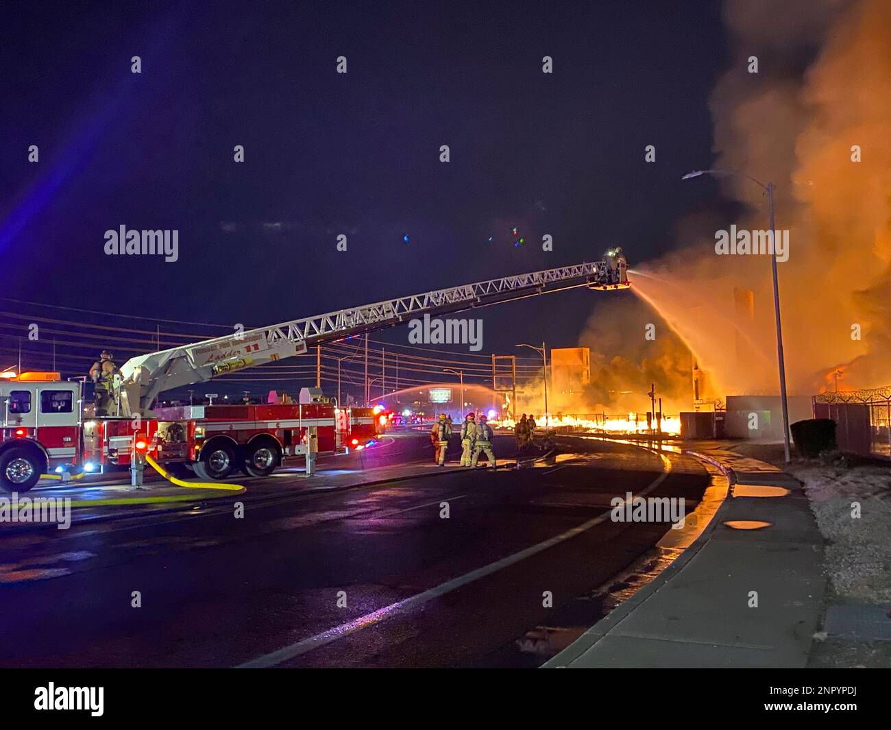 In this photo provided by the Phoenix Fire Department, firefighters ...