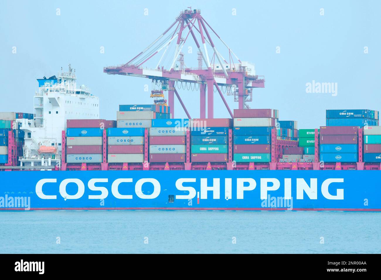 A COSCO Shipping container ship is seen in a port in Qingdao in east ...