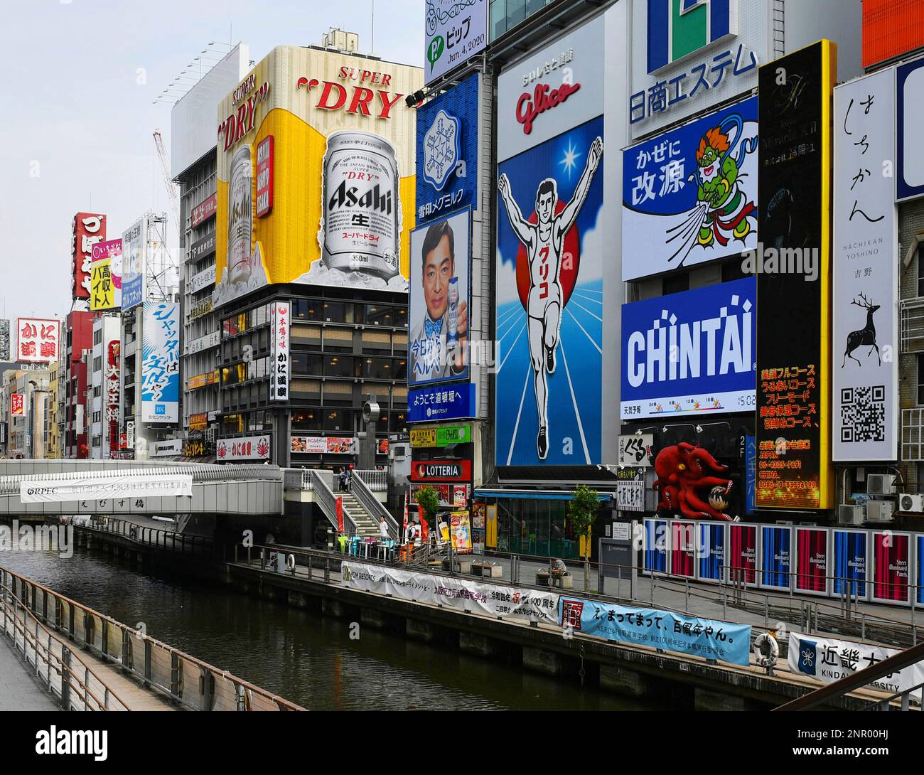 A photo shows a bustling area with huge billboards at Dotonbori District in Osaka on June 4 ...