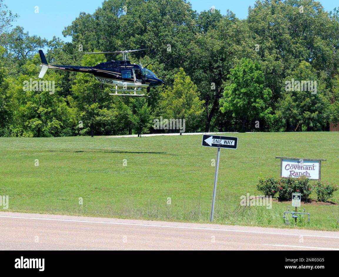 A Tennessee Highway Patrol helicopter lands about 12:30 p.m. Monday at ...