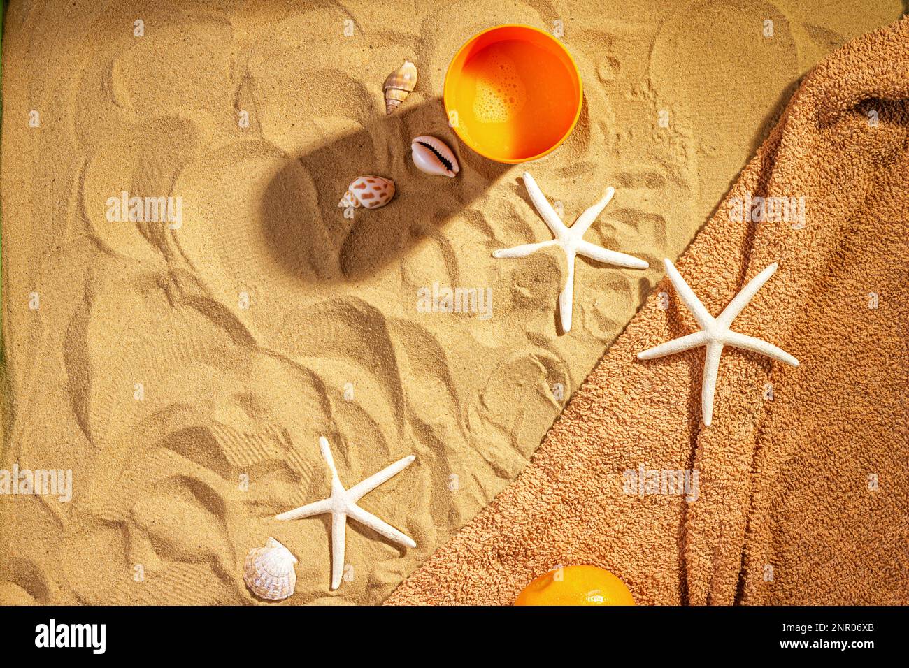 Concept of sandy beach holiday, top view. Sand background with copy ...