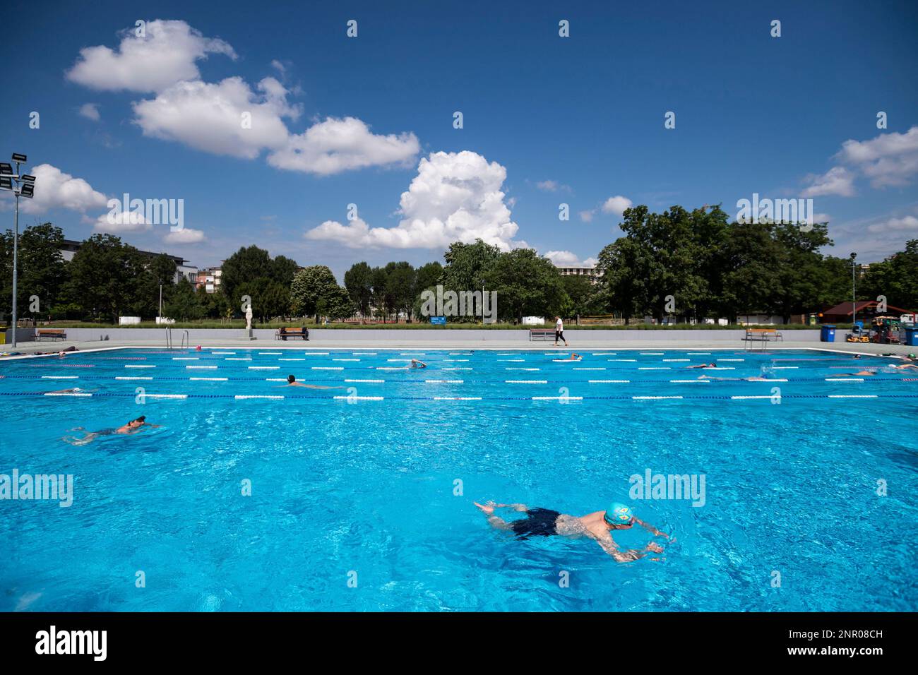 Guests swim in a pool at Paskal Swimming Pool in Budapest, Hungary ...
