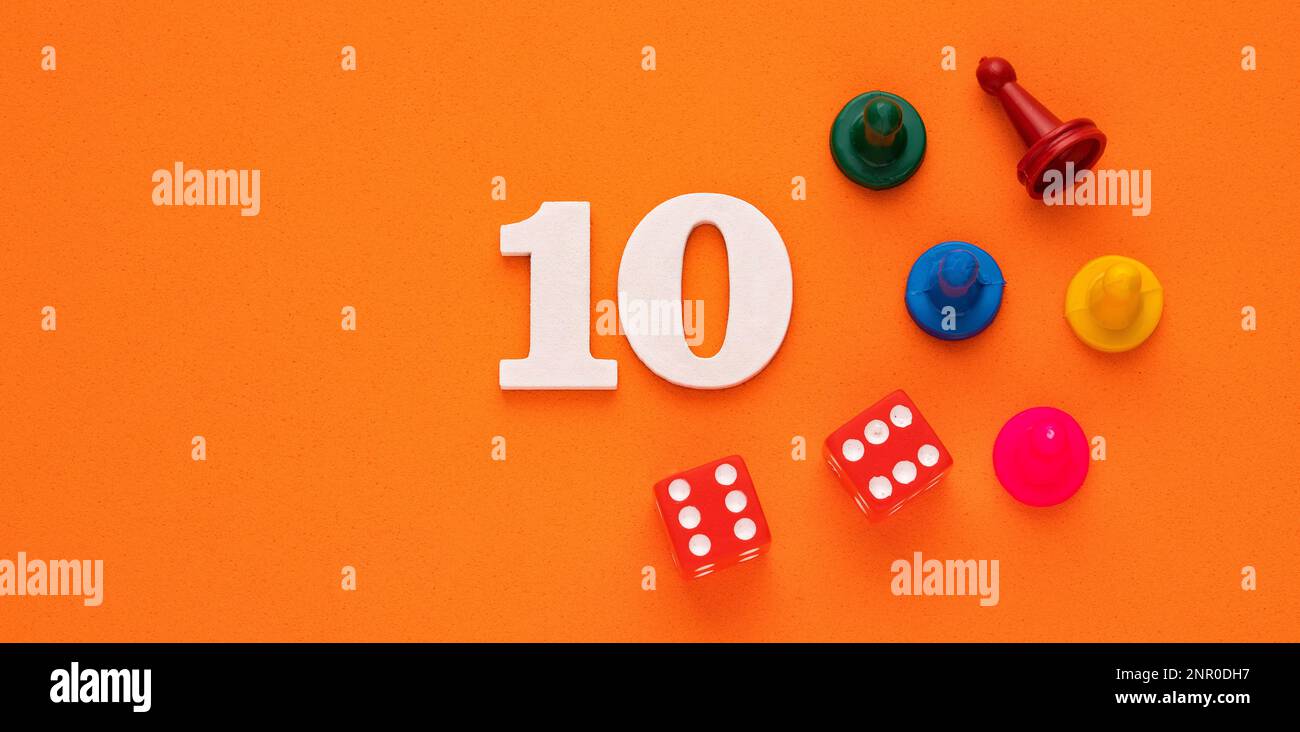 Number ten in white with pieces and gambling dice - Orange eva rubber ...