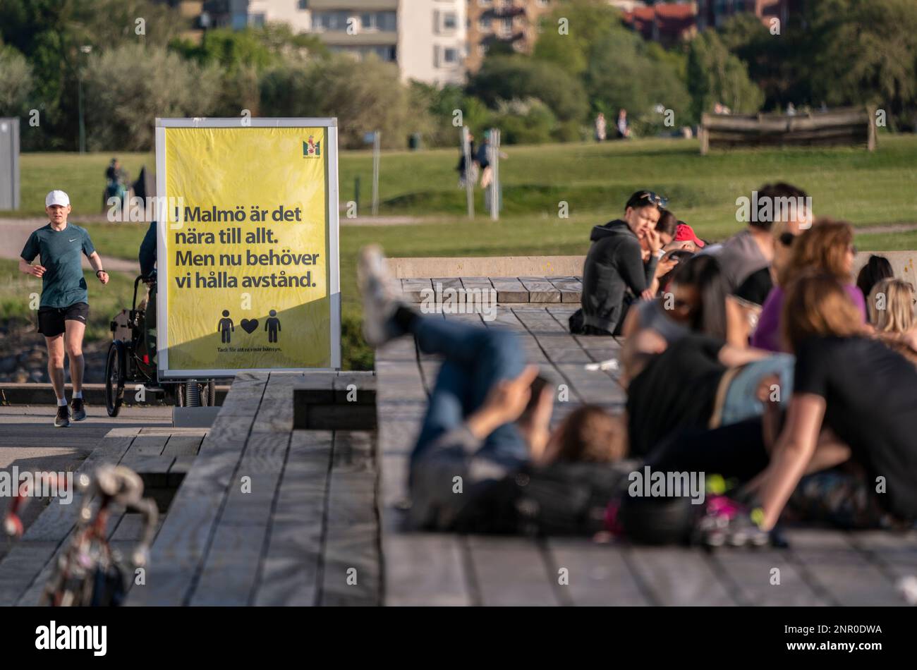 People enjoy the warm evening weather in Malmo, Sweden, Tuesday May 26 ...