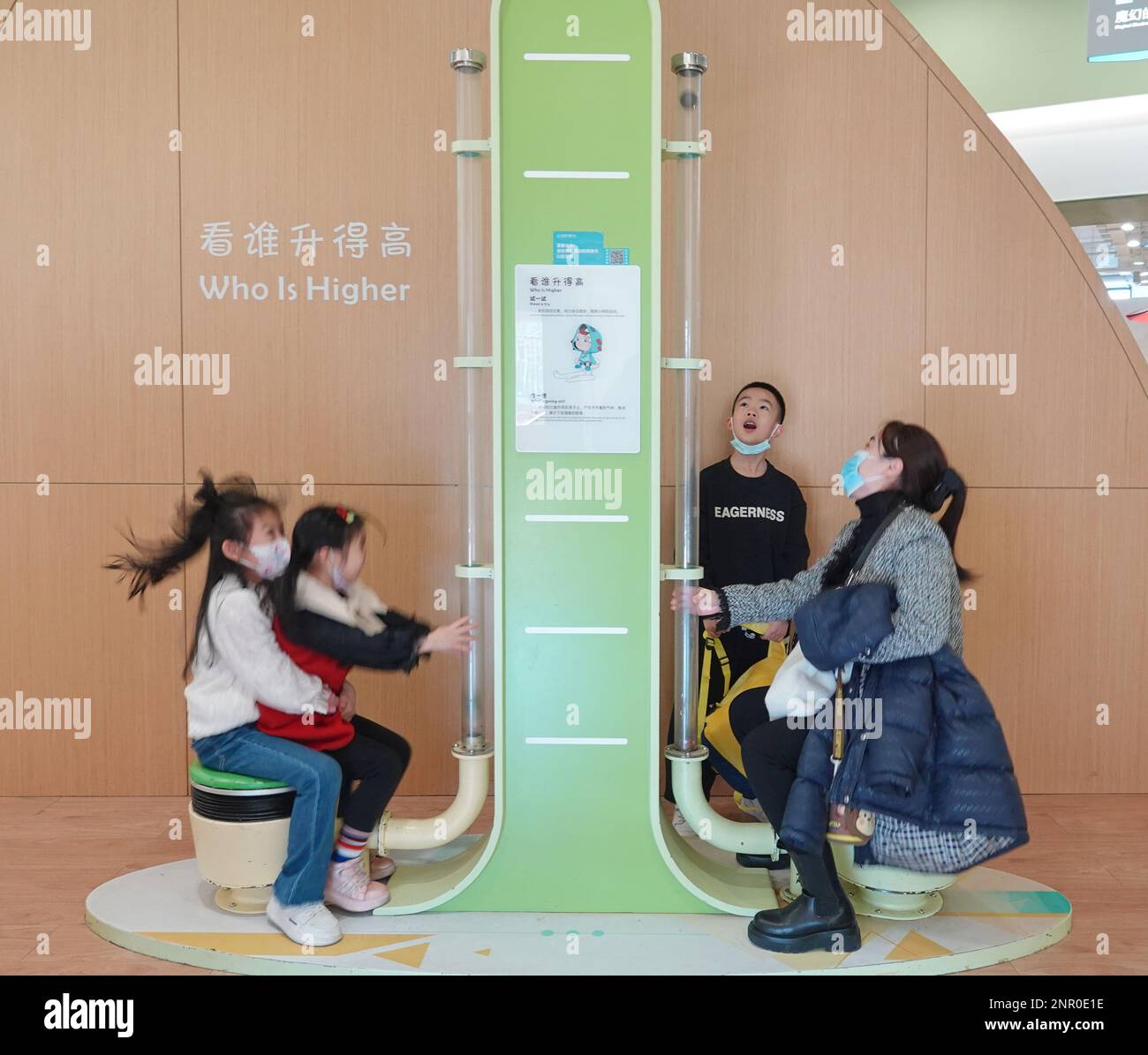 QINGDAO, CHINA - FEBRUARY 26, 2023 - Children and their parents ...