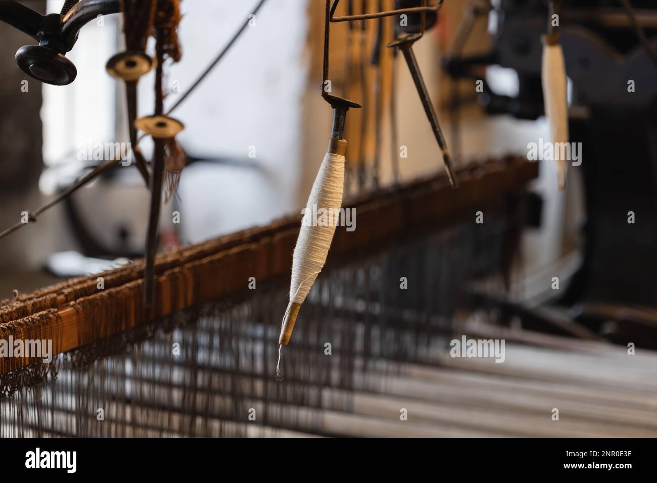 picture of a hand spindle with wool on a historic weaving machine Stock ...