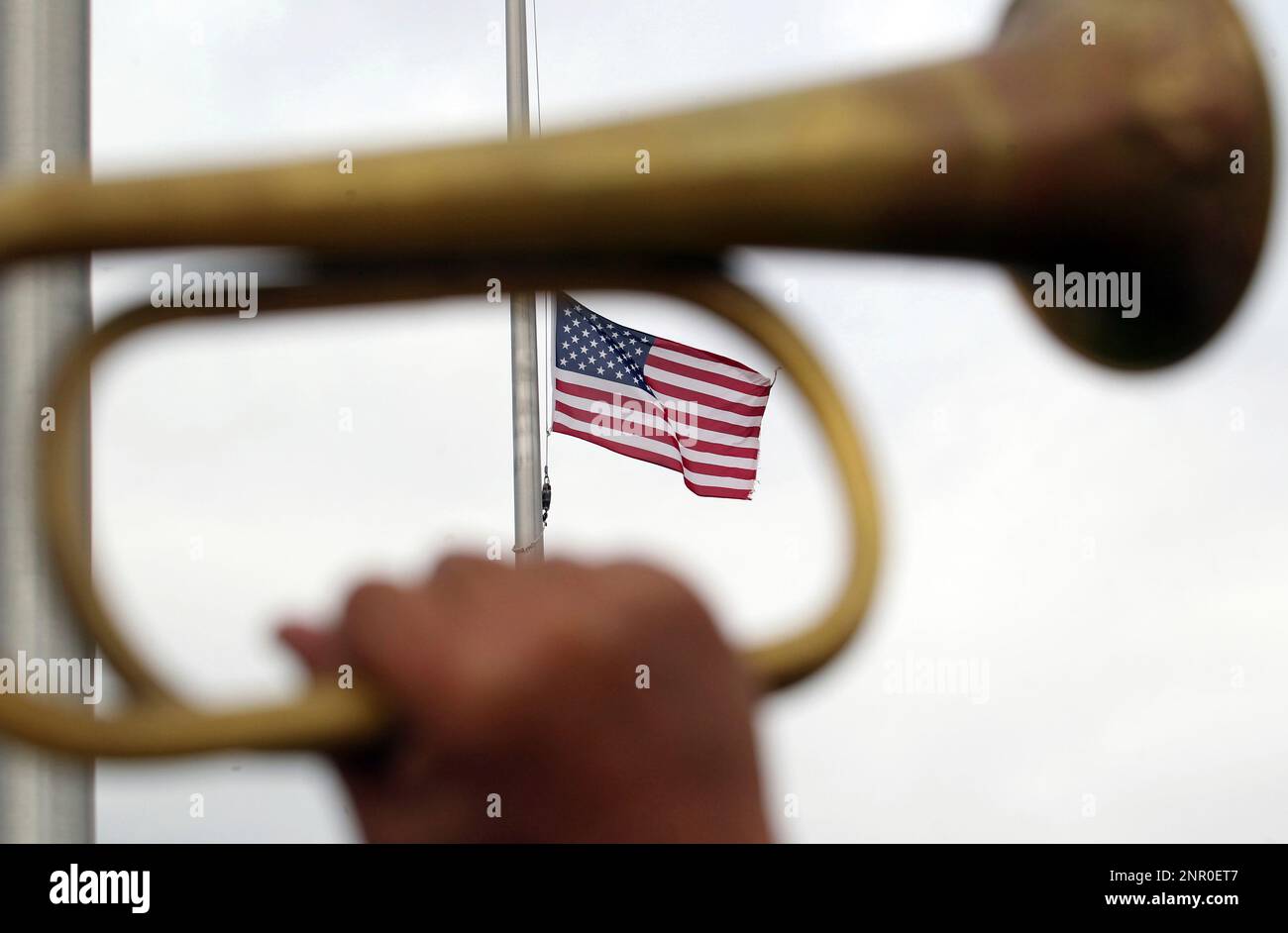 Taps are played after a 21 gun salute during Memorial Day ceremonies at ...