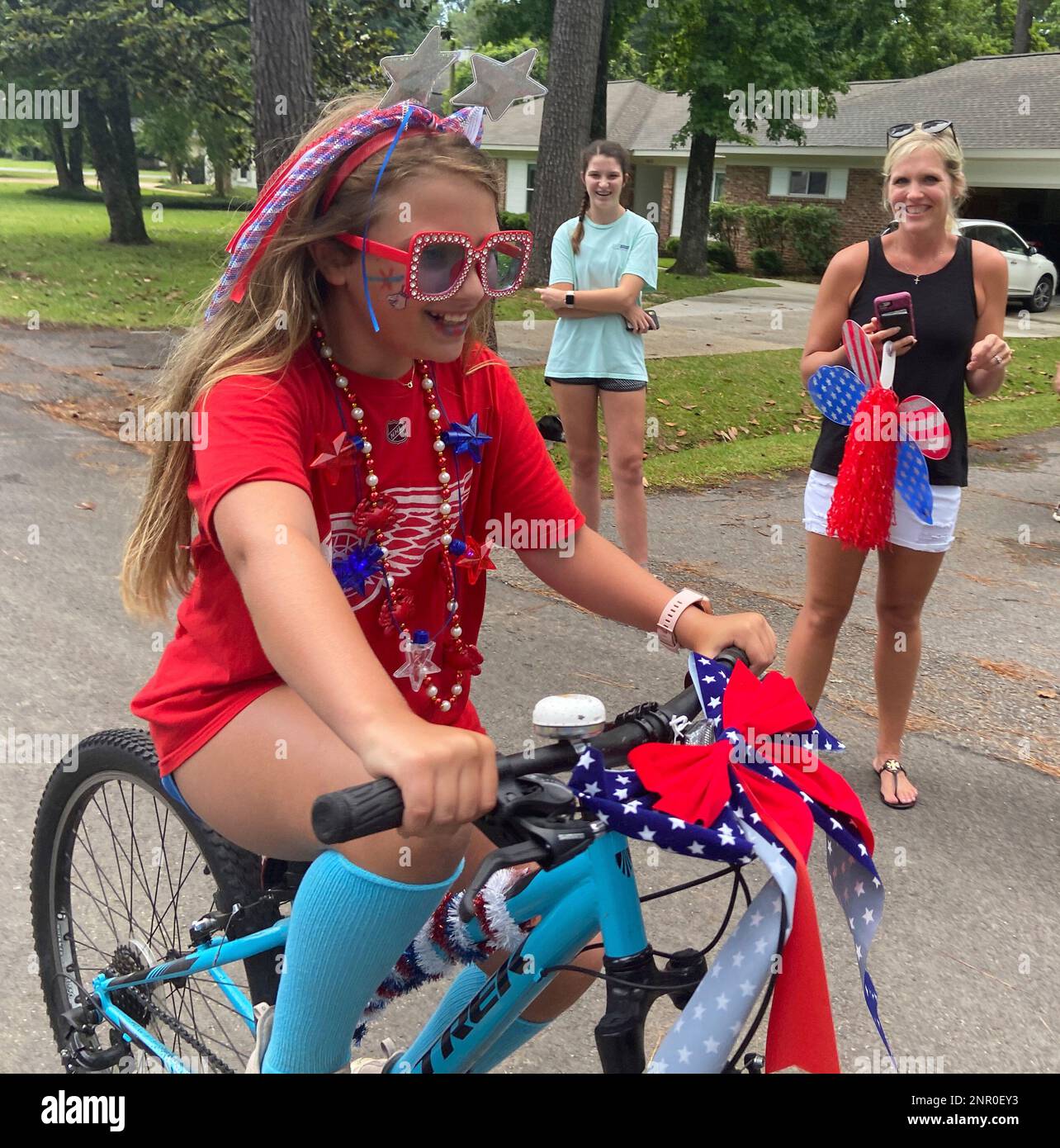 Anne Larkin rides her bicycle during a Memorial Day parade in Meridian ...