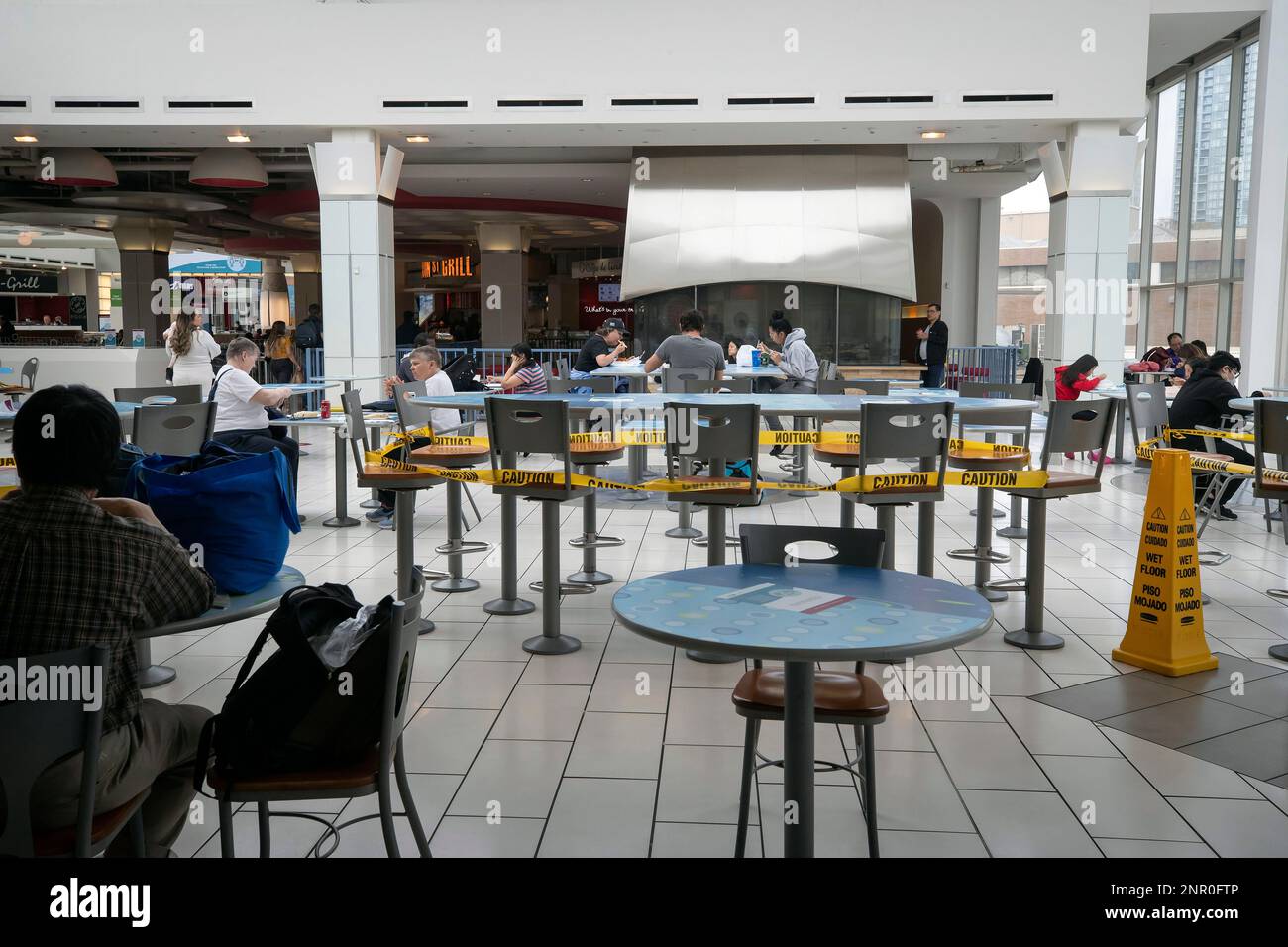 People eat at the food court at Metropolis at Metrotown shopping mall ...