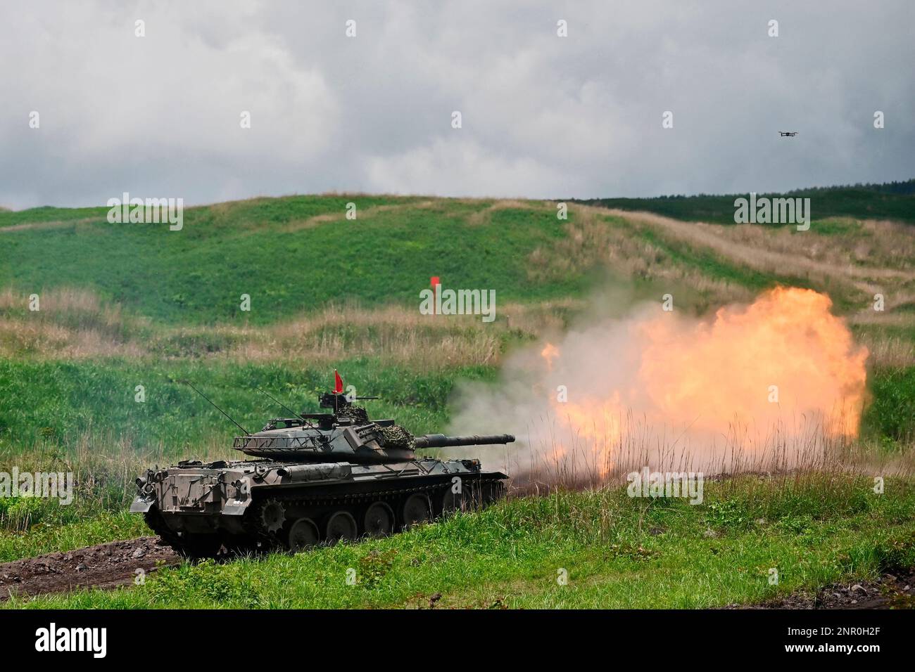 A Japan Ground Self-Defense Force's tank fires during an annual live ...