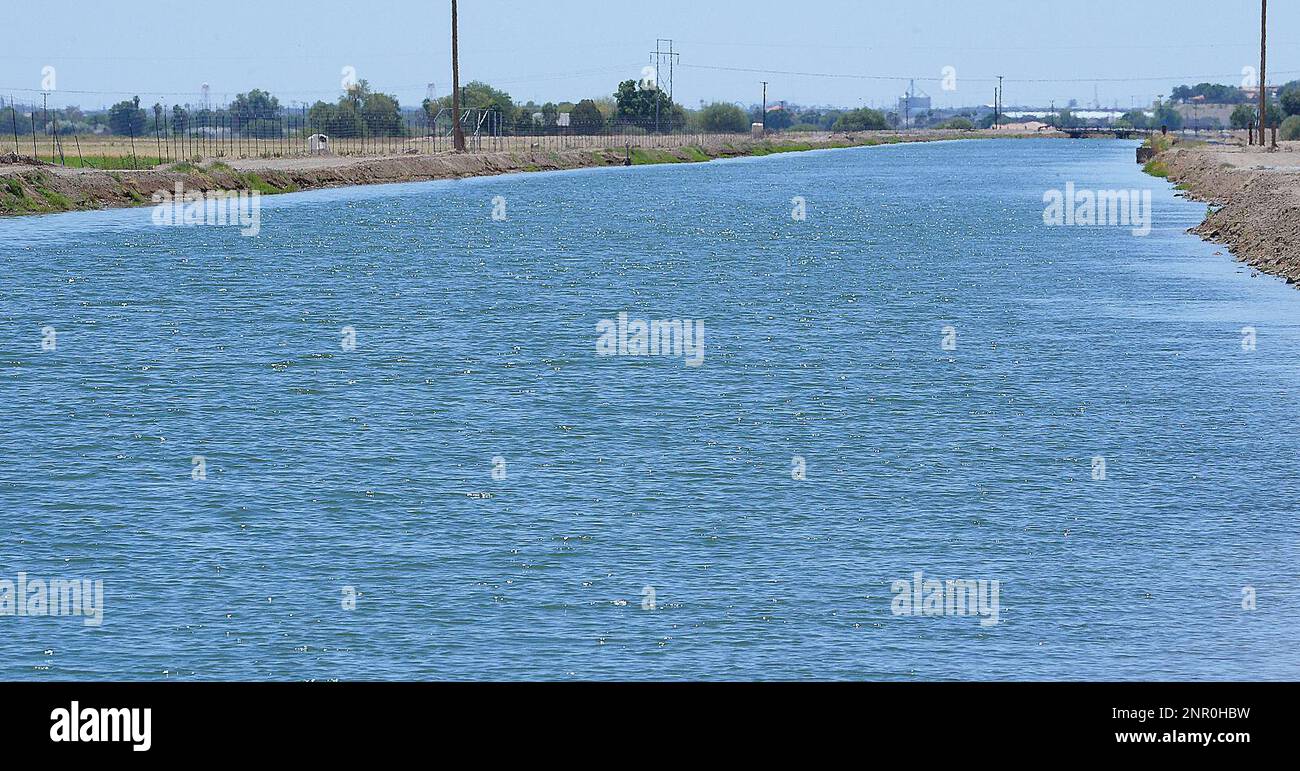 Sparkling water flows in the morning through the Yuma Main Canal toward ...