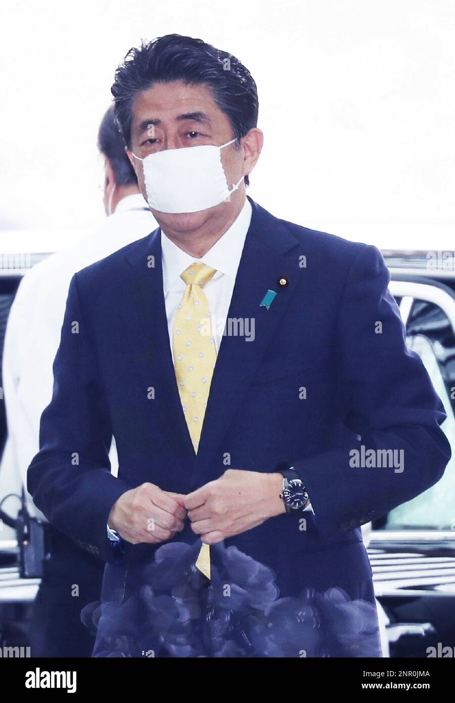 Japan's Prime Minister Shinzo Abe wearing a face mask (abenomask ...