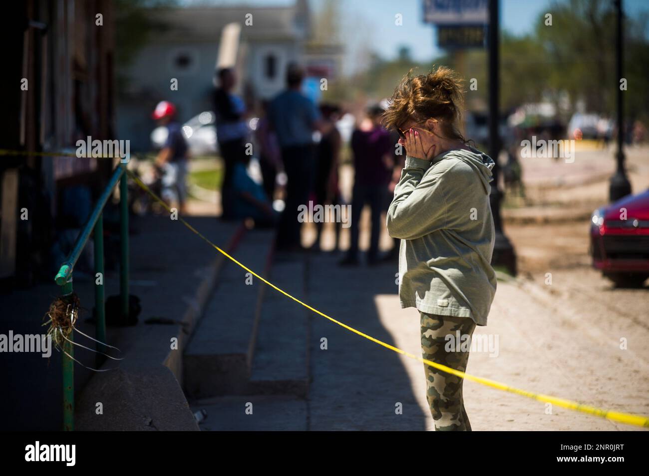 Sanford, Mich., resident Beverly Stinson is overcome with emotion as ...