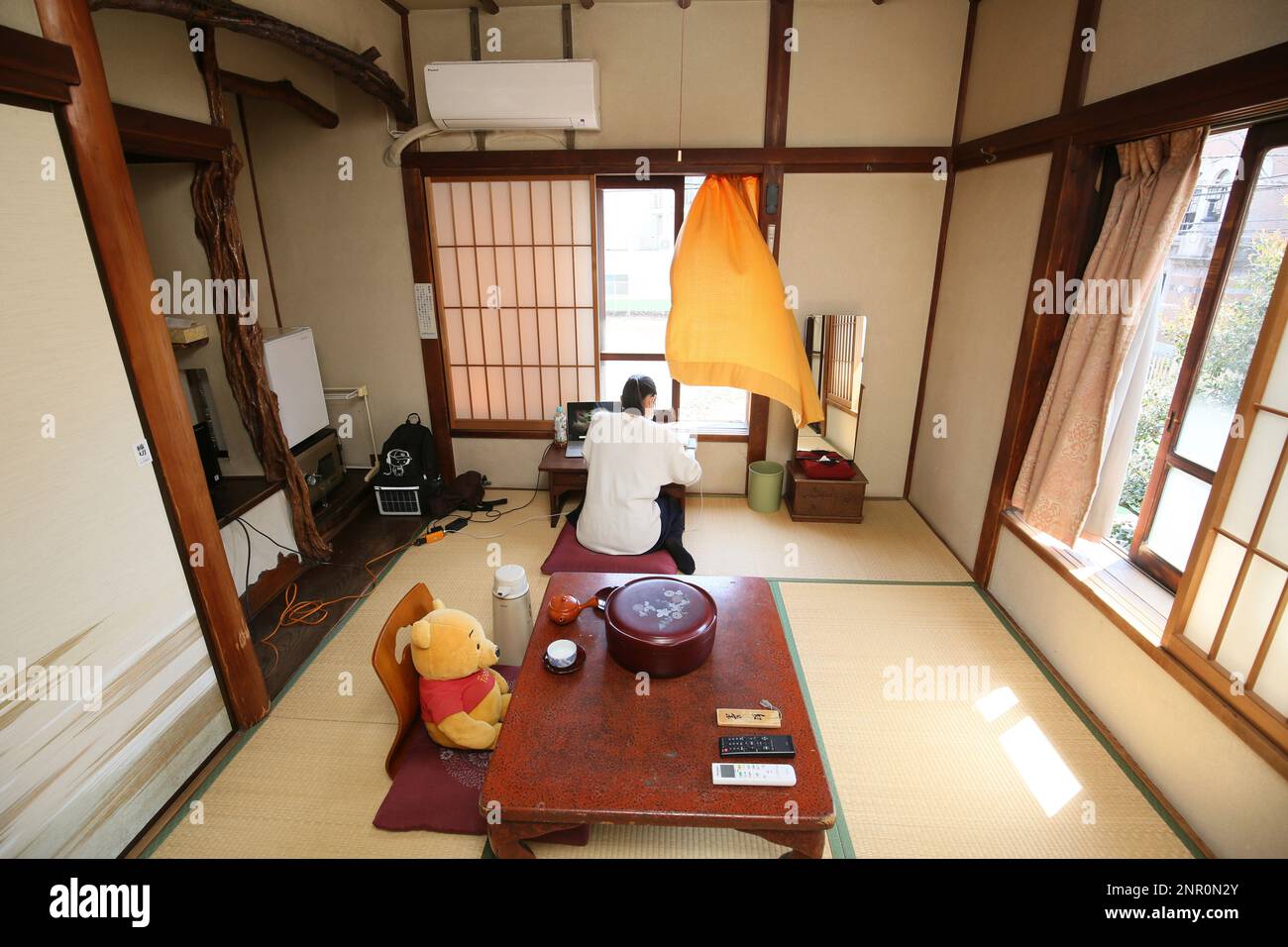 Yuki Murakami telecommutes from a room at Homeikan inn's Morikawa Annex ...