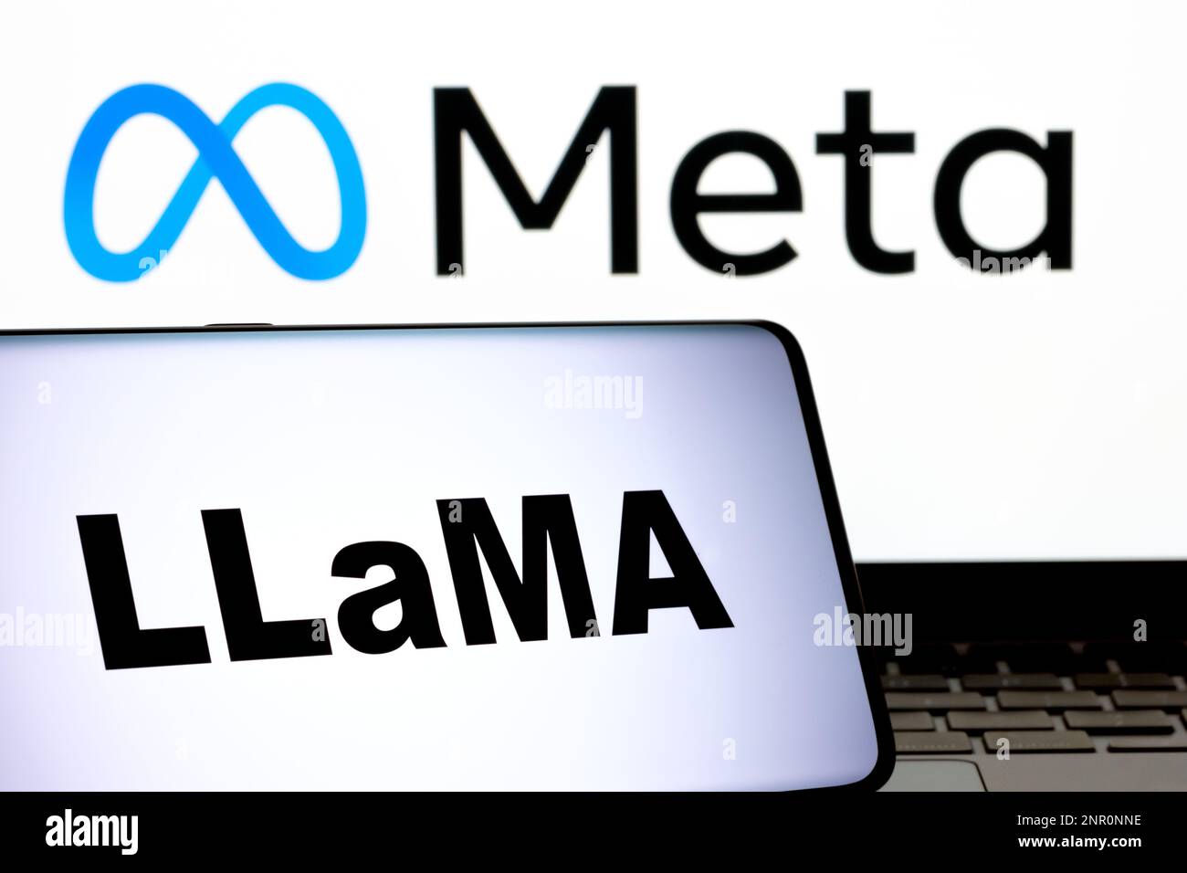 LLaMA letters seen on smartphone and blurred Meta company logo on ... LLaMA letters seen on smartphone and blurred Meta company logo on ...