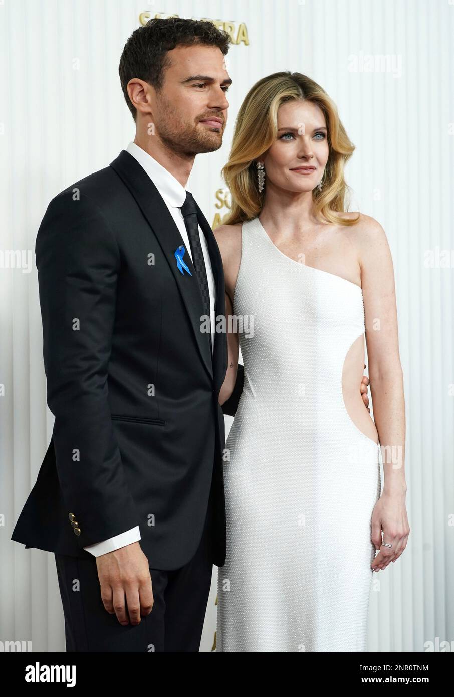Theo James, left, and Meghann Fahy arrive at the 29th annual Screen ...