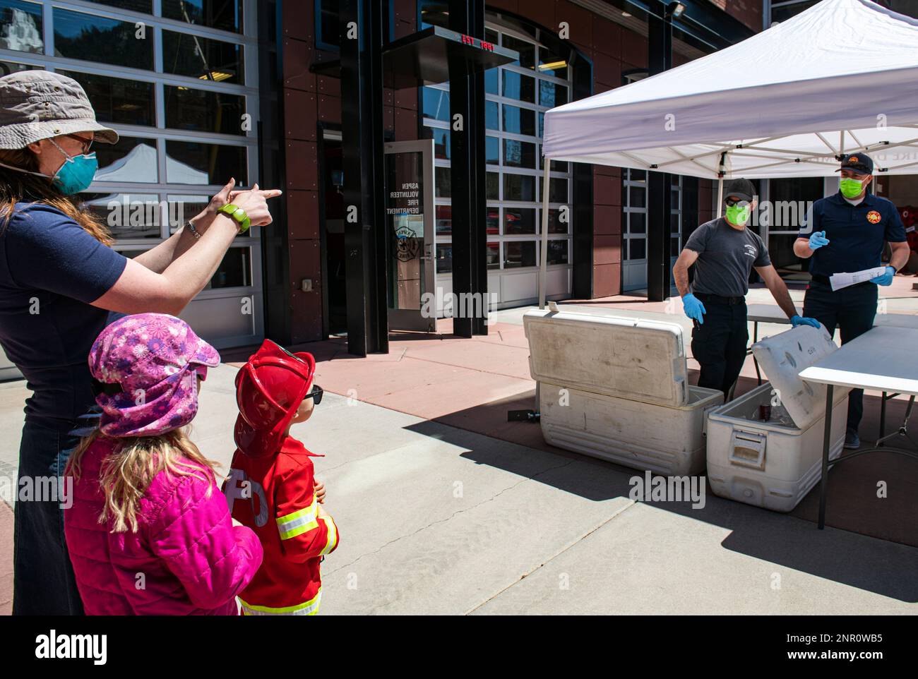 Amber Franze, left, and her children Ethan, 3, and Addilyn, 5, thank ...