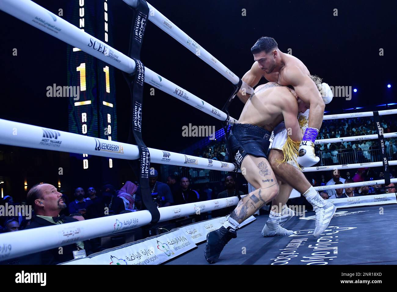 Jake Paul, left, and Tommy Fury, in action during their boxing match ...