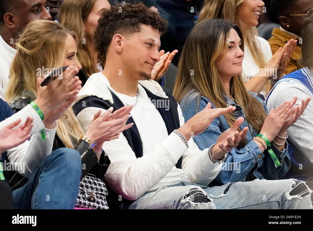 Kansas City Chiefs quarterback Patrick Mahomes claps during an NBA ...