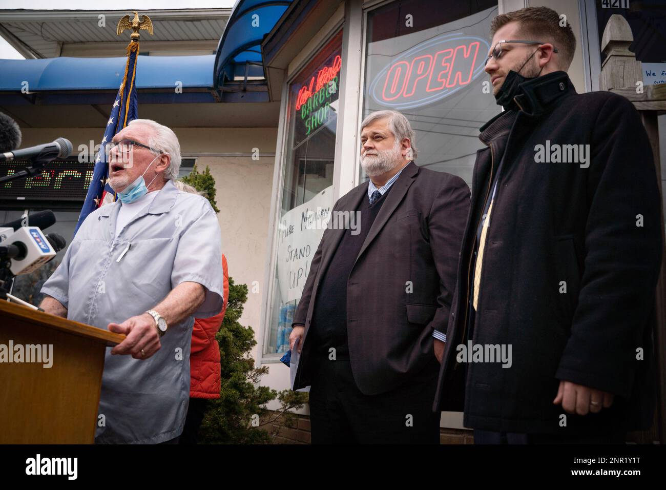 Karl Manke, 77, left, speaks during a press conference alongside his ...