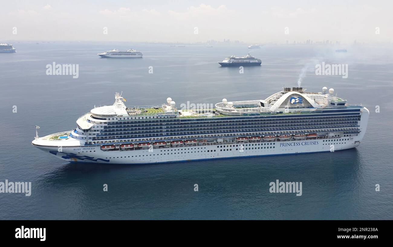 In this photo provided by the Philippine Coast Guard, cruise ship MV ...