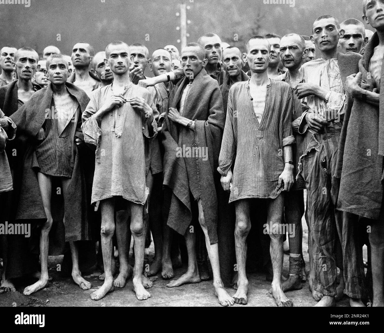 FILE - In this May 7, 1945 file photo emaciated prisoners at one of the ...