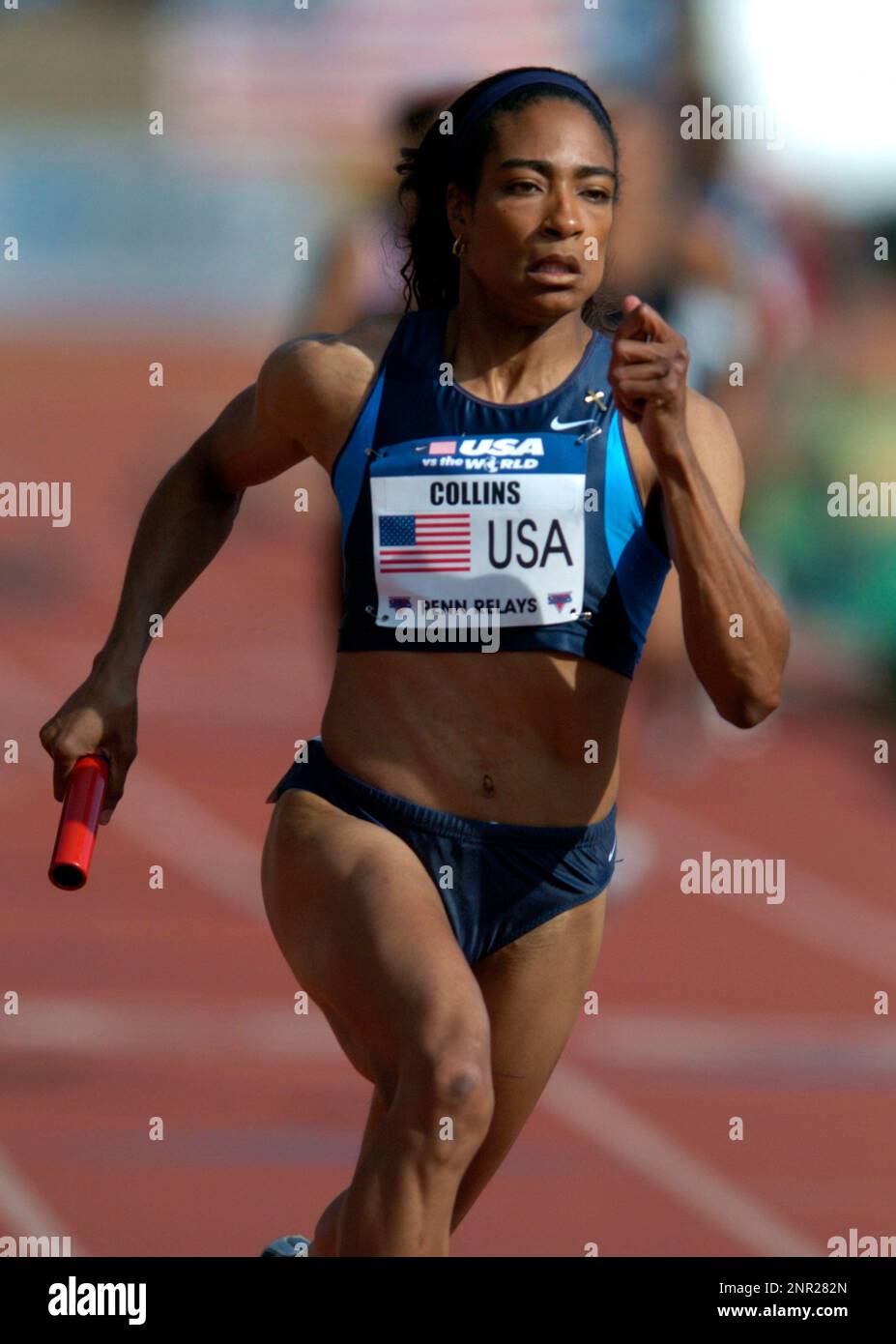 Michelle Collins runs the first leg of USA White team that was third in ...