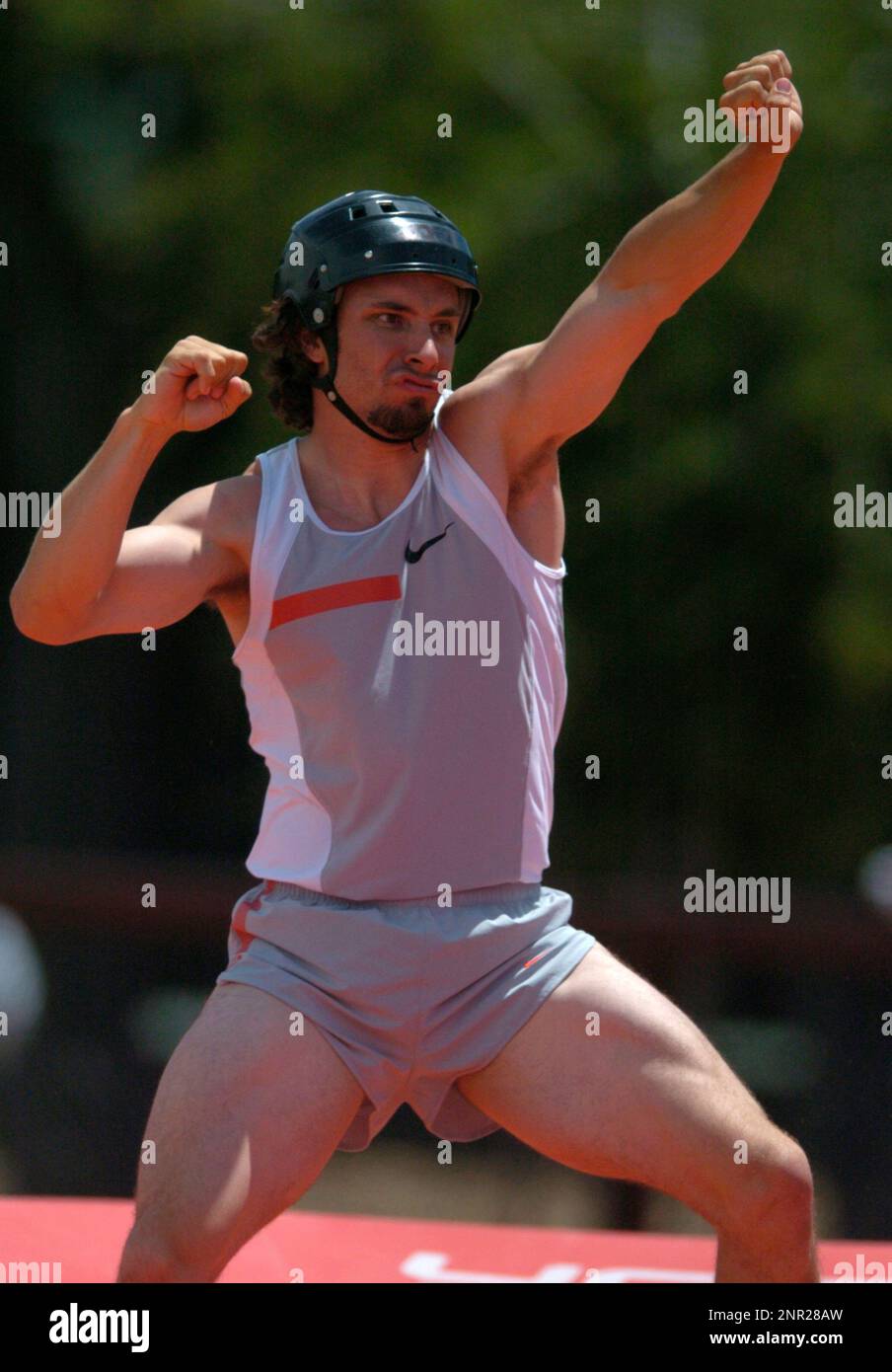Toby Stevenson celebrates a clearance in the men's pole vault in the ...