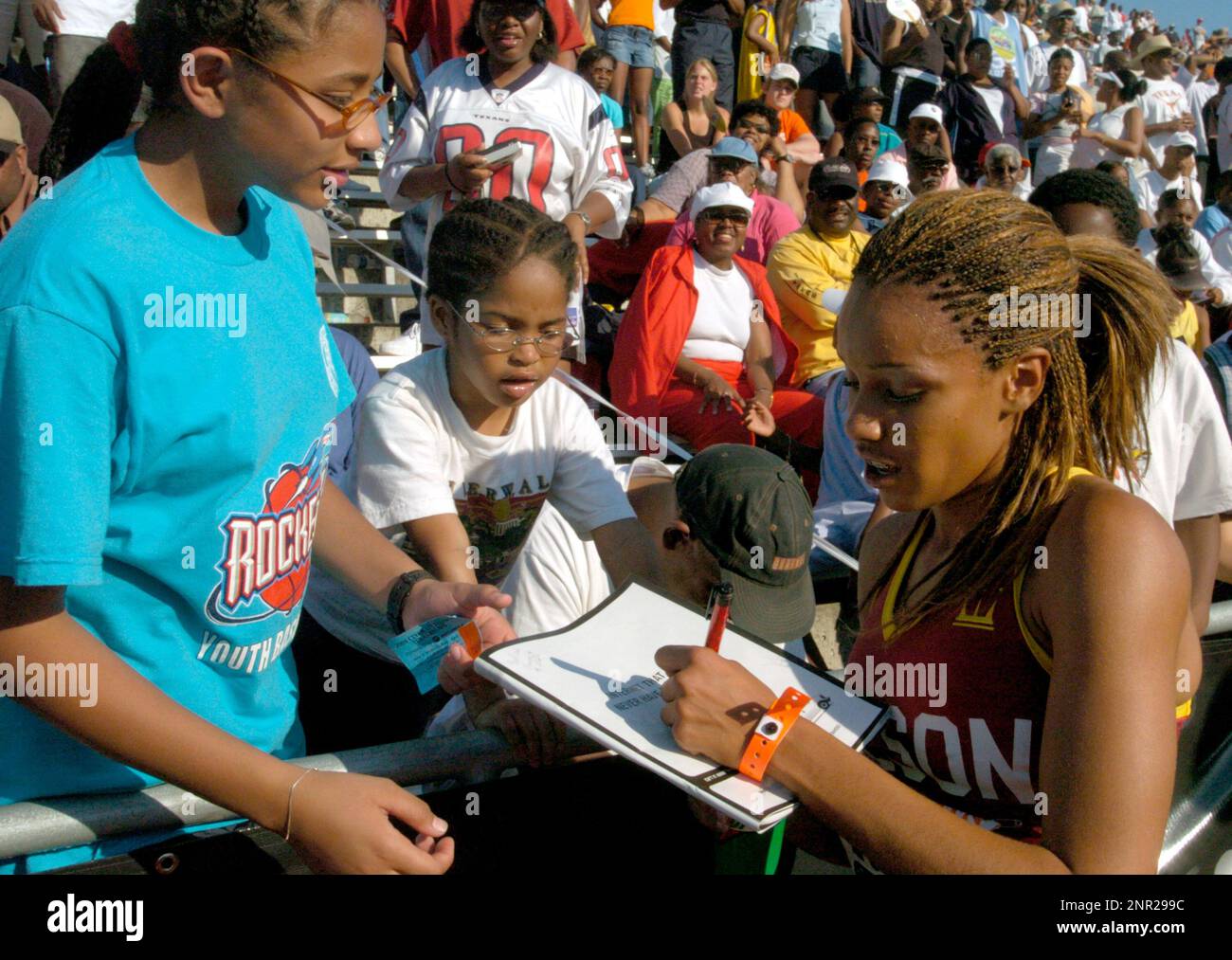 Carol Rodriguez of Long Beach Wilson High signs an autograph after ...