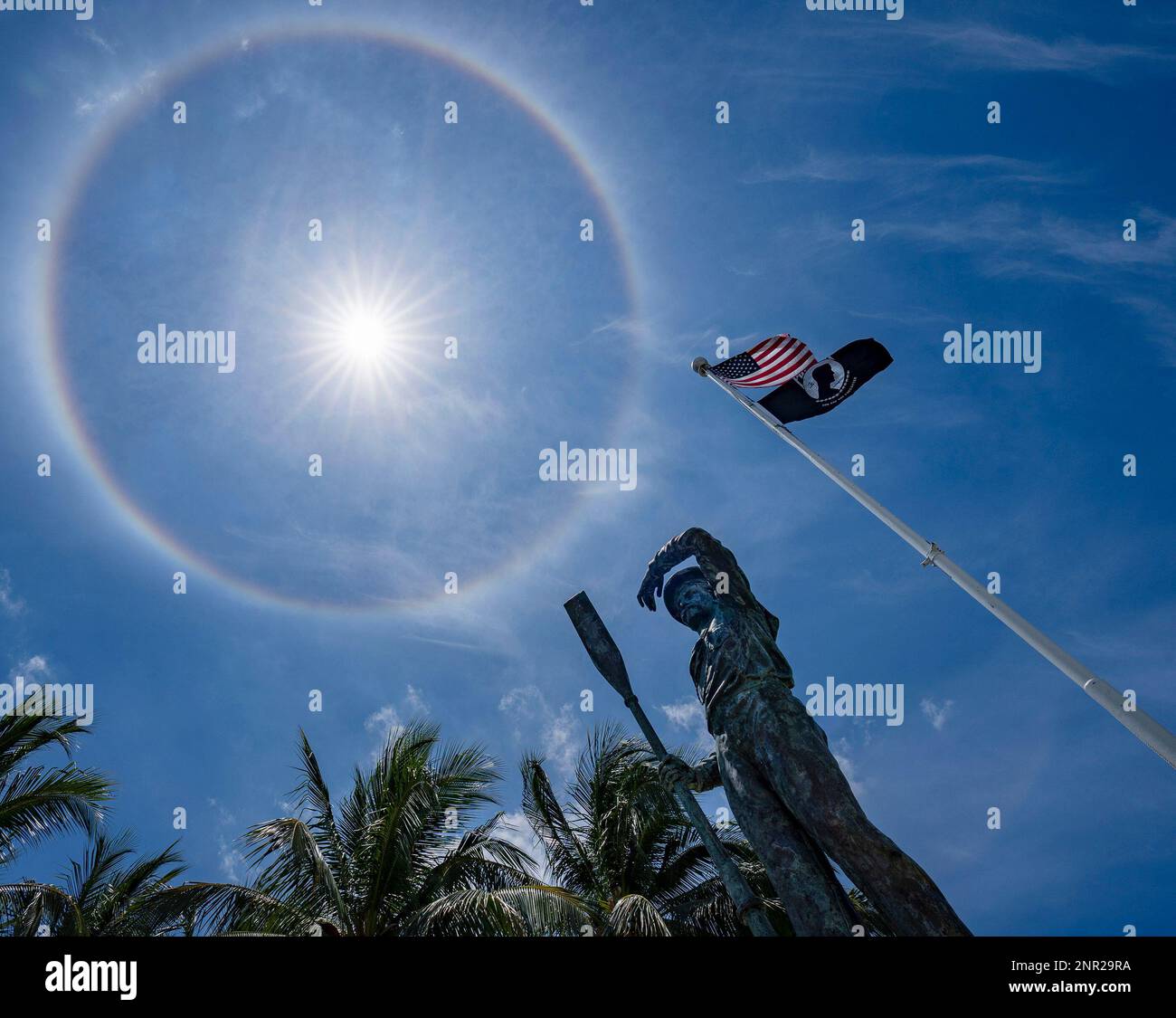 A solar halo, also known as a 22 degree halo, appears over Key West ...