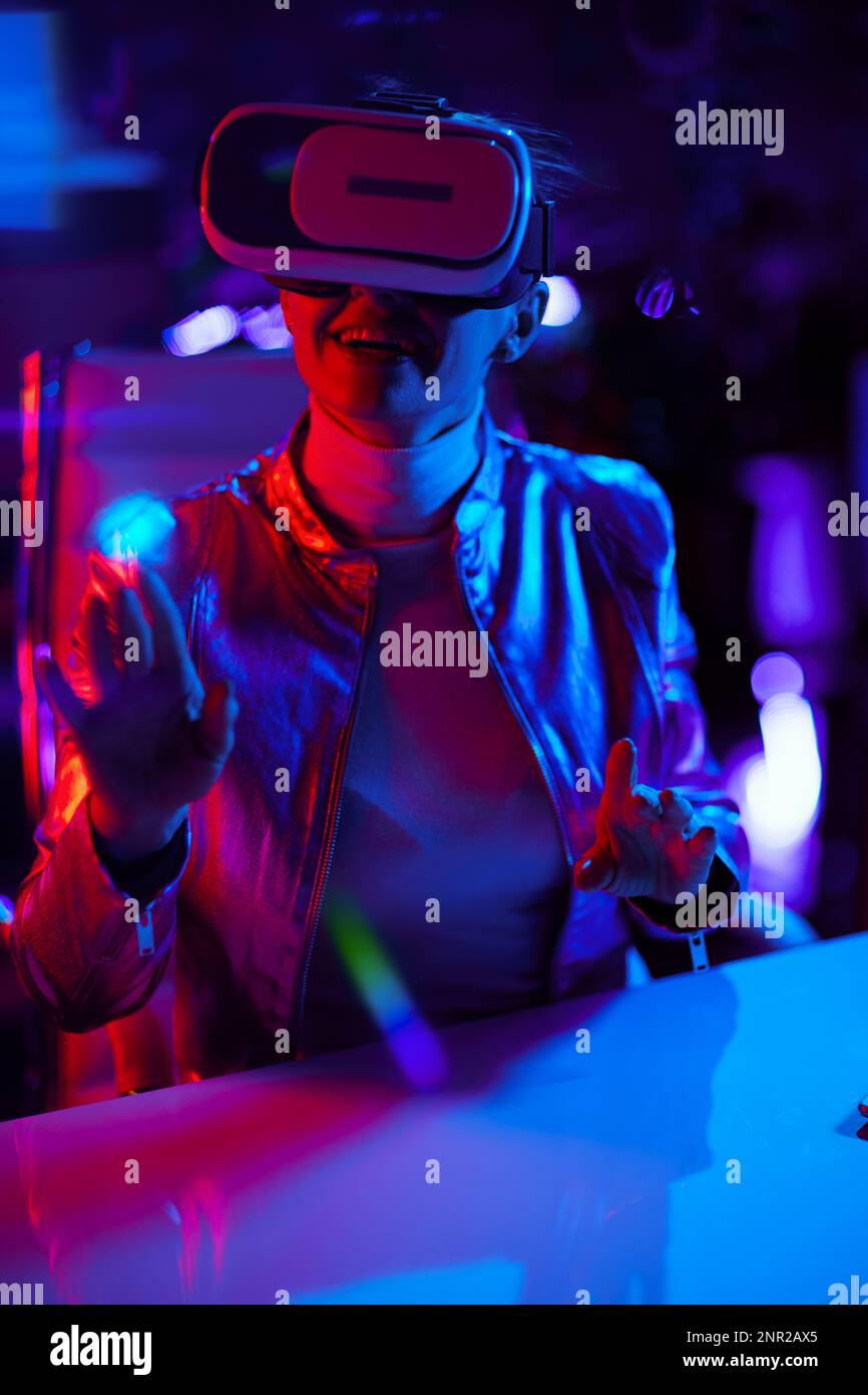 Neon metaverse futuristic concept. smiling trendy female in virtual ...