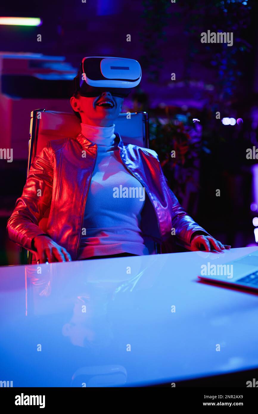 Neon metaverse futuristic concept. relaxed modern woman in virtual ...