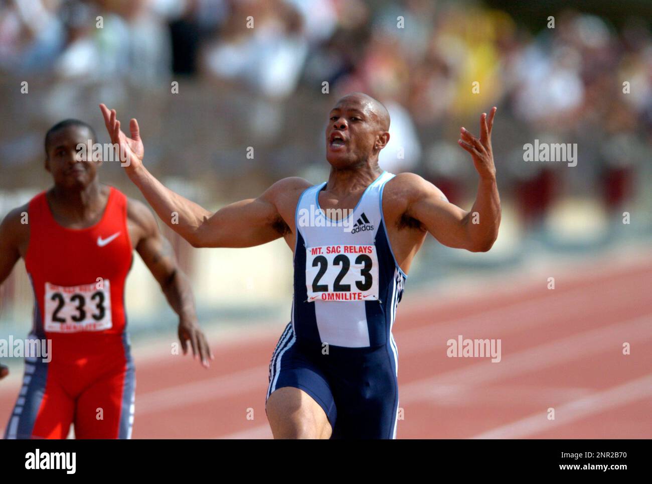 Maurice Greene celebrates after defeating world record holder Tim ...