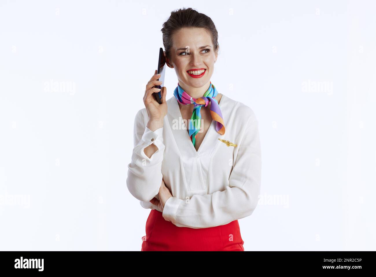 happy stylish air hostess woman against white background in uniform ...