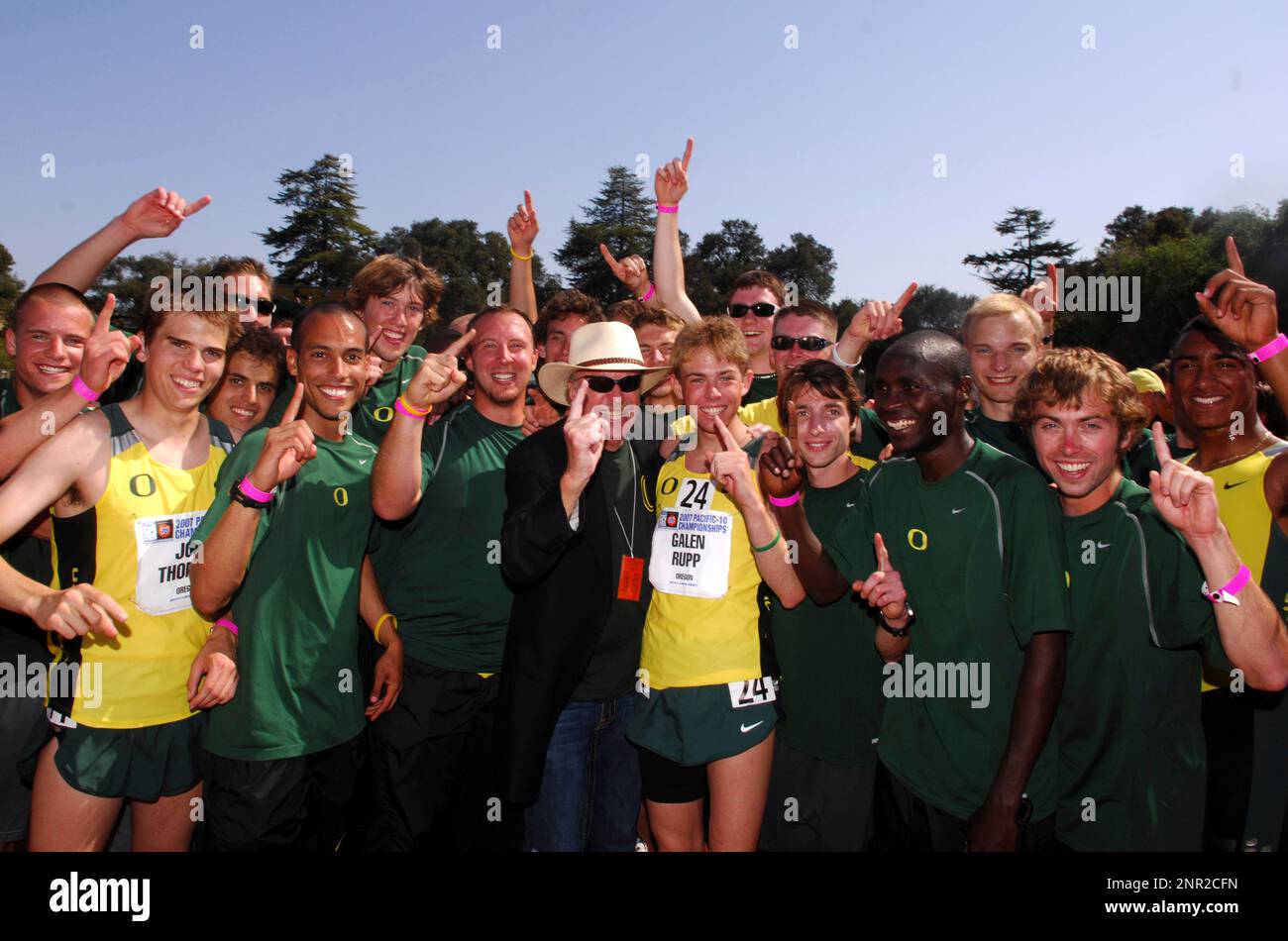 Nike co-founder Phil Knight poses with Galen Rupp and the Oregon men's ...