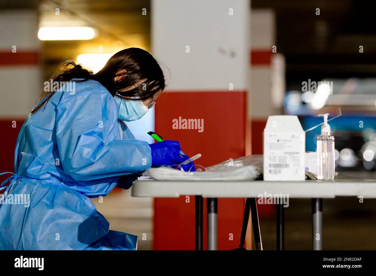 MELBOURNE, AUSTRALIA - APRIL 30: A nurse wearing full PPE processes ...