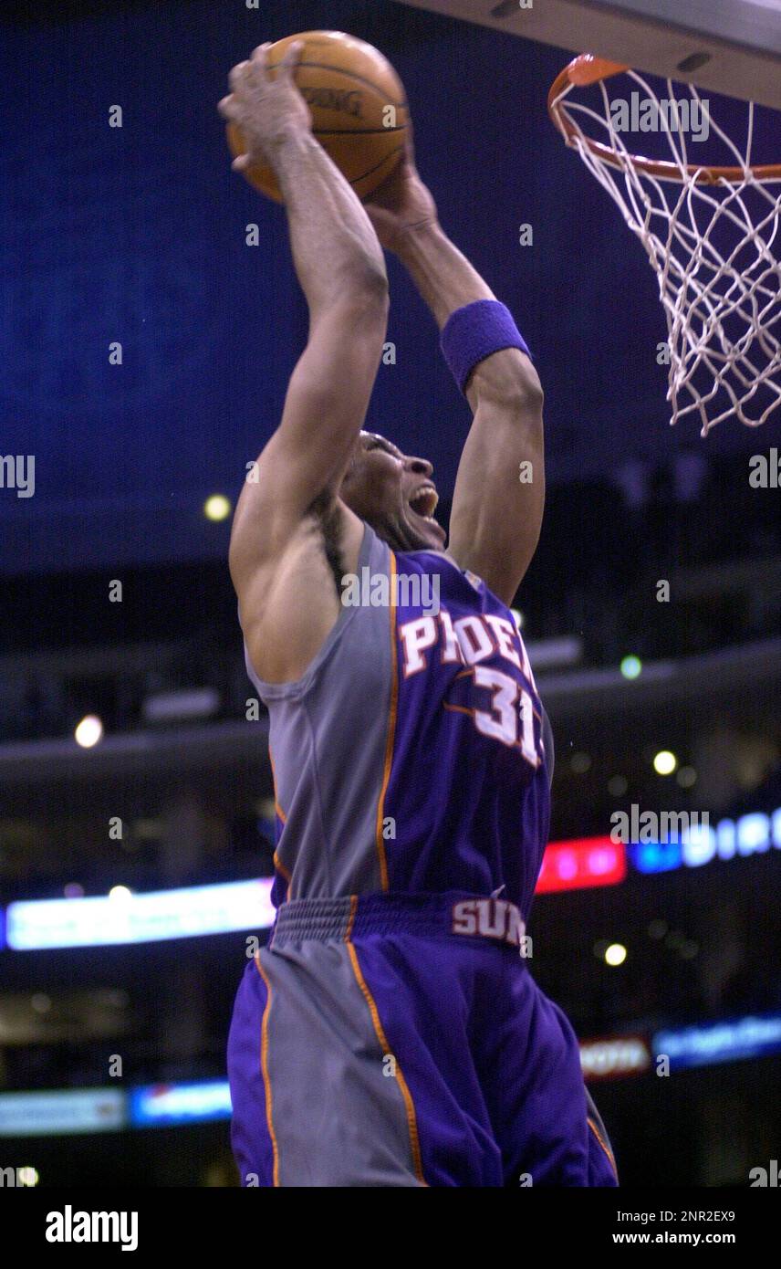 Shawn Marion of the Phoenix Suns dunks for 2 of his 17 points during ...