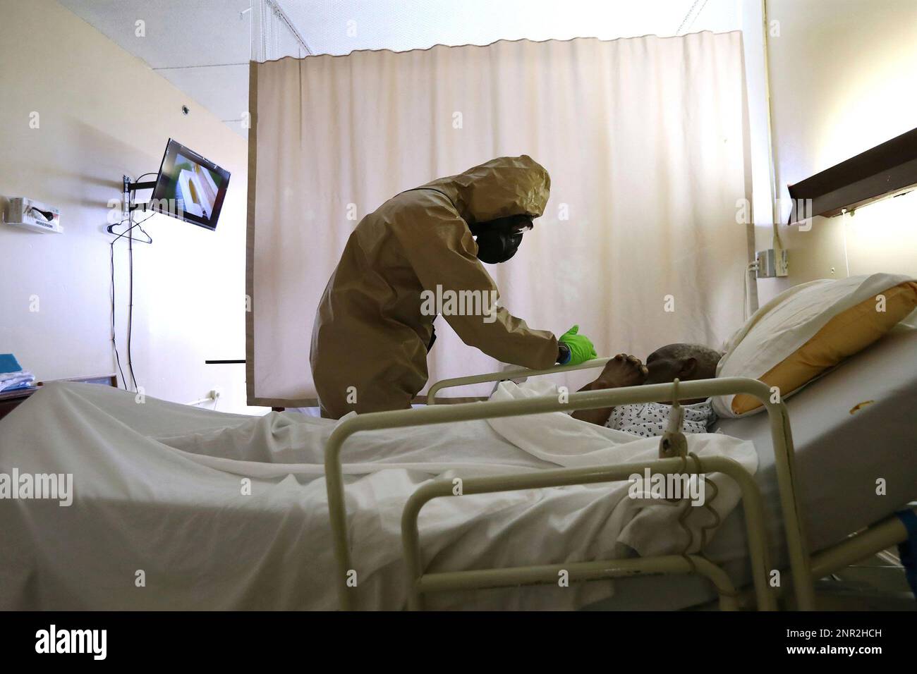 A member of the Georgia Army National Guard infection control team from ...