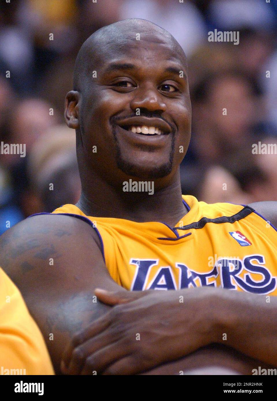Shaquille O'Neal of the Los Angeles Lakers watches from the bench ...