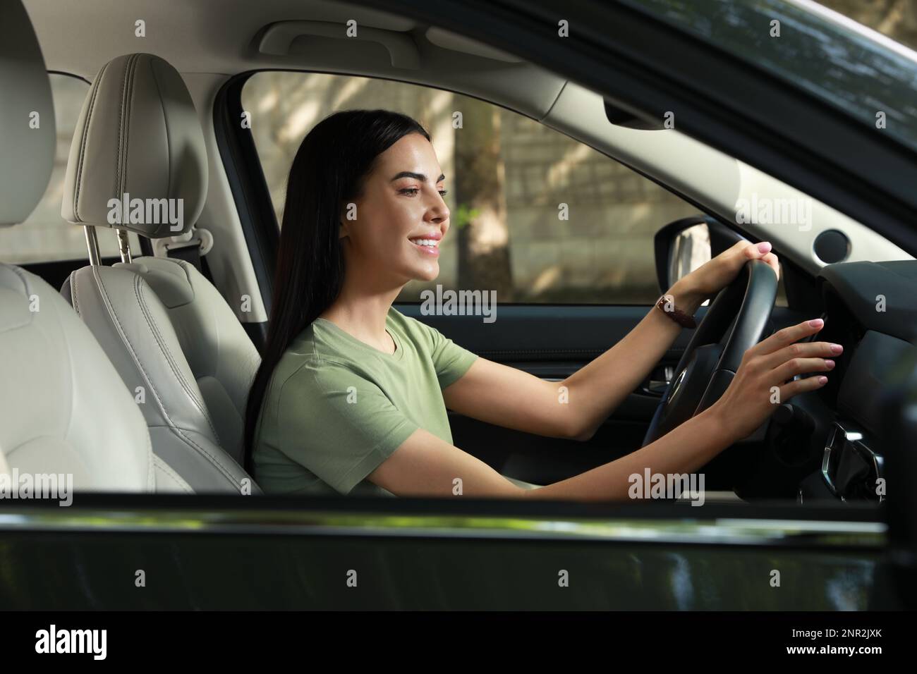 Young woman using navigation system while driving car Stock Photo - Alamy Young woman using navigation system while driving car Stock Photo - Alamy
