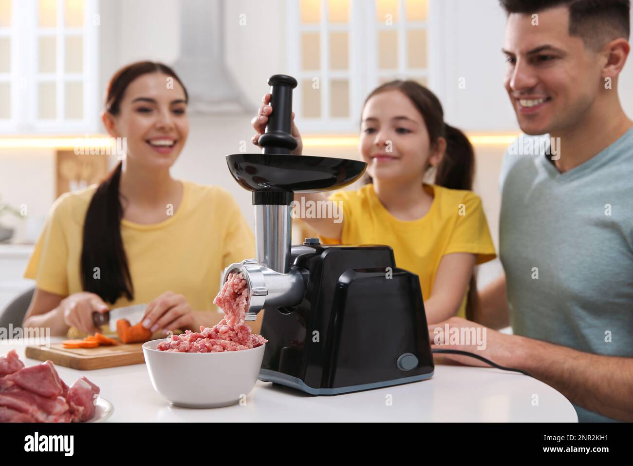Happy family making dinner together in kitchen, father and daughter ...