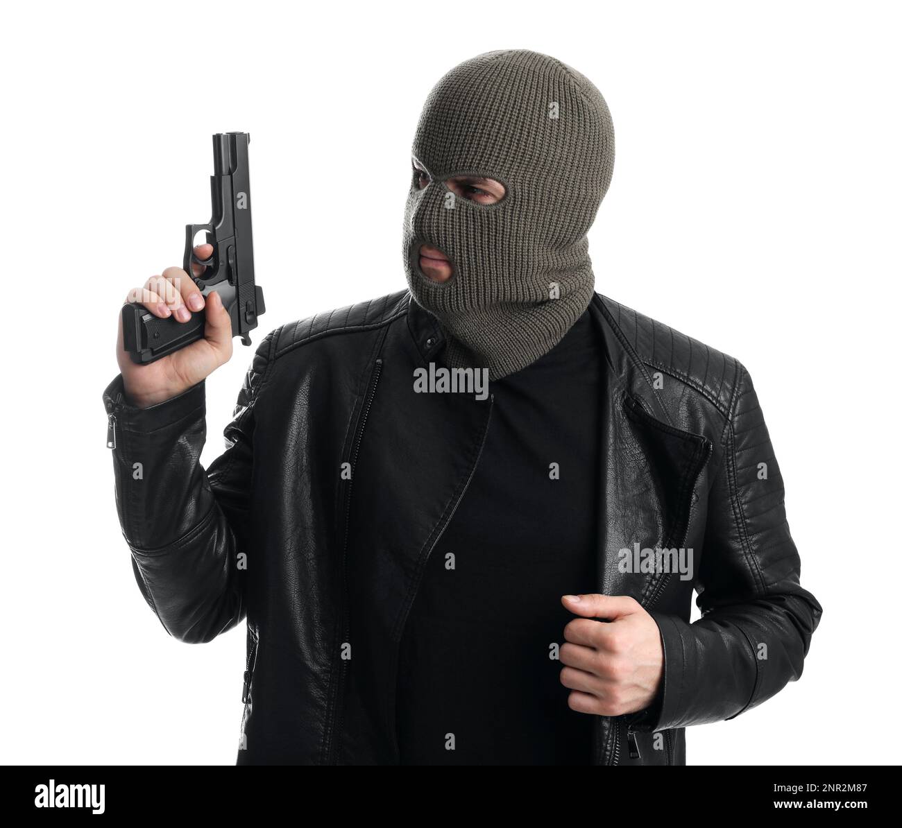 Man wearing knitted balaclava with gun on white background Stock Photo ...
