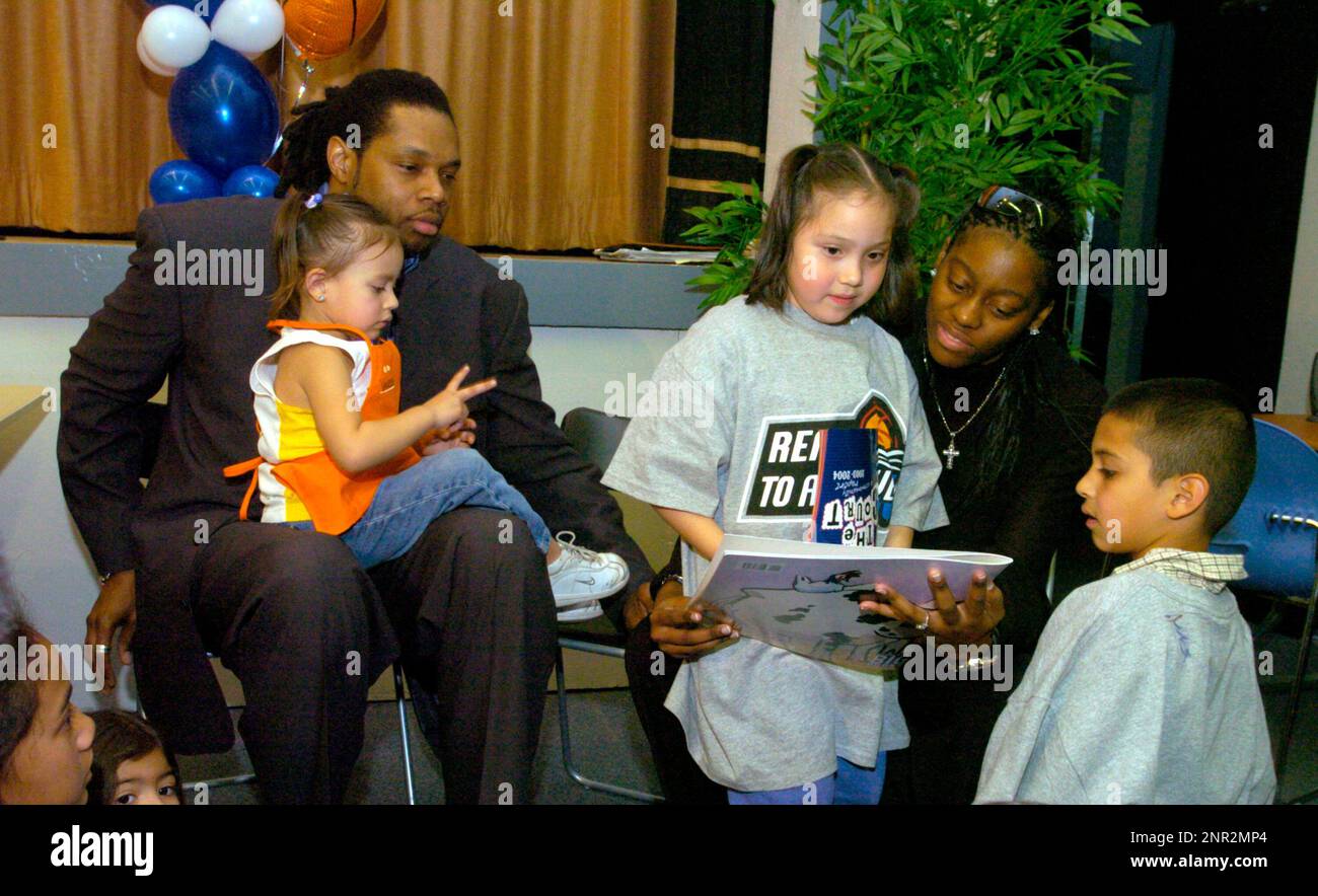 Former Los Angeles Laker Sam Perkins (left) and Nikki Teasley of the ...